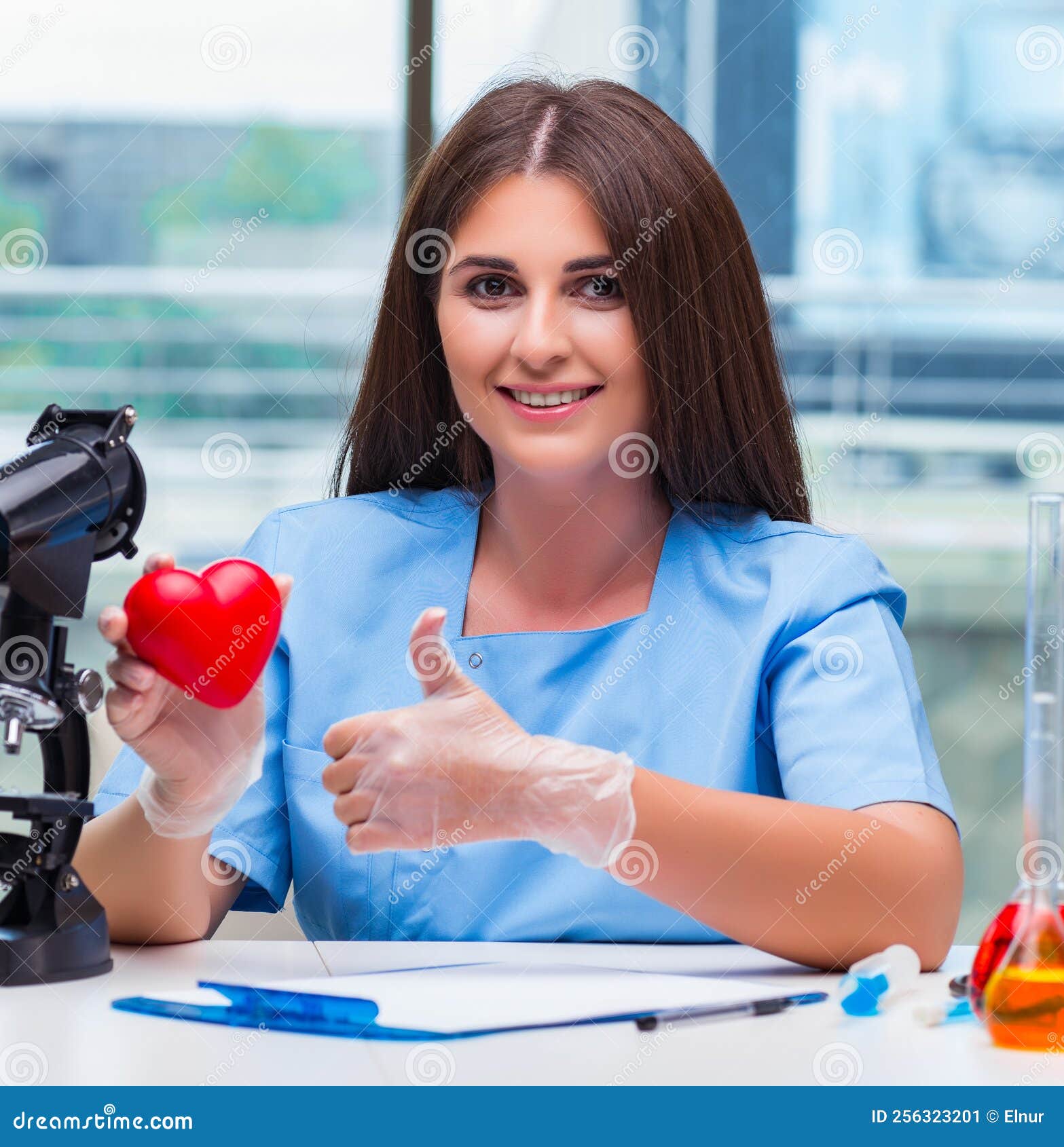Young Doctor with Red Heart in Lab Stock Image - Image of exam, blood ...