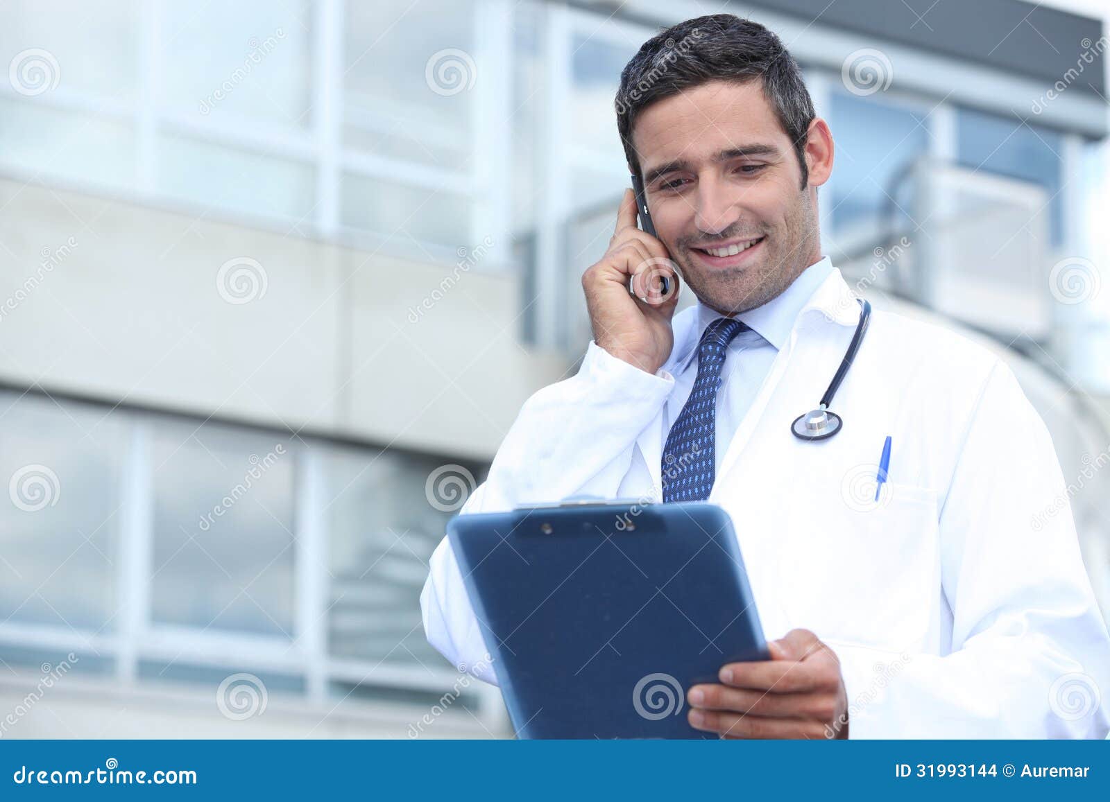 Young doctor stood outside stock photo. Image of healthcare - 31993144