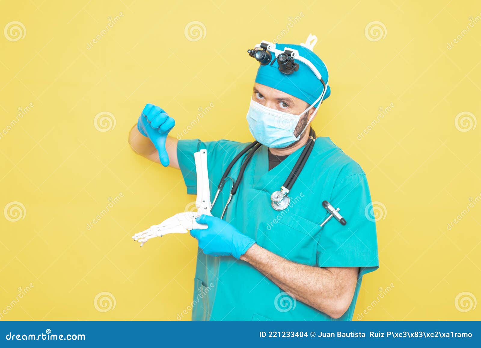 Young Doctor-surgeon Dressed in Green on Yellow Background Stock Photo ...