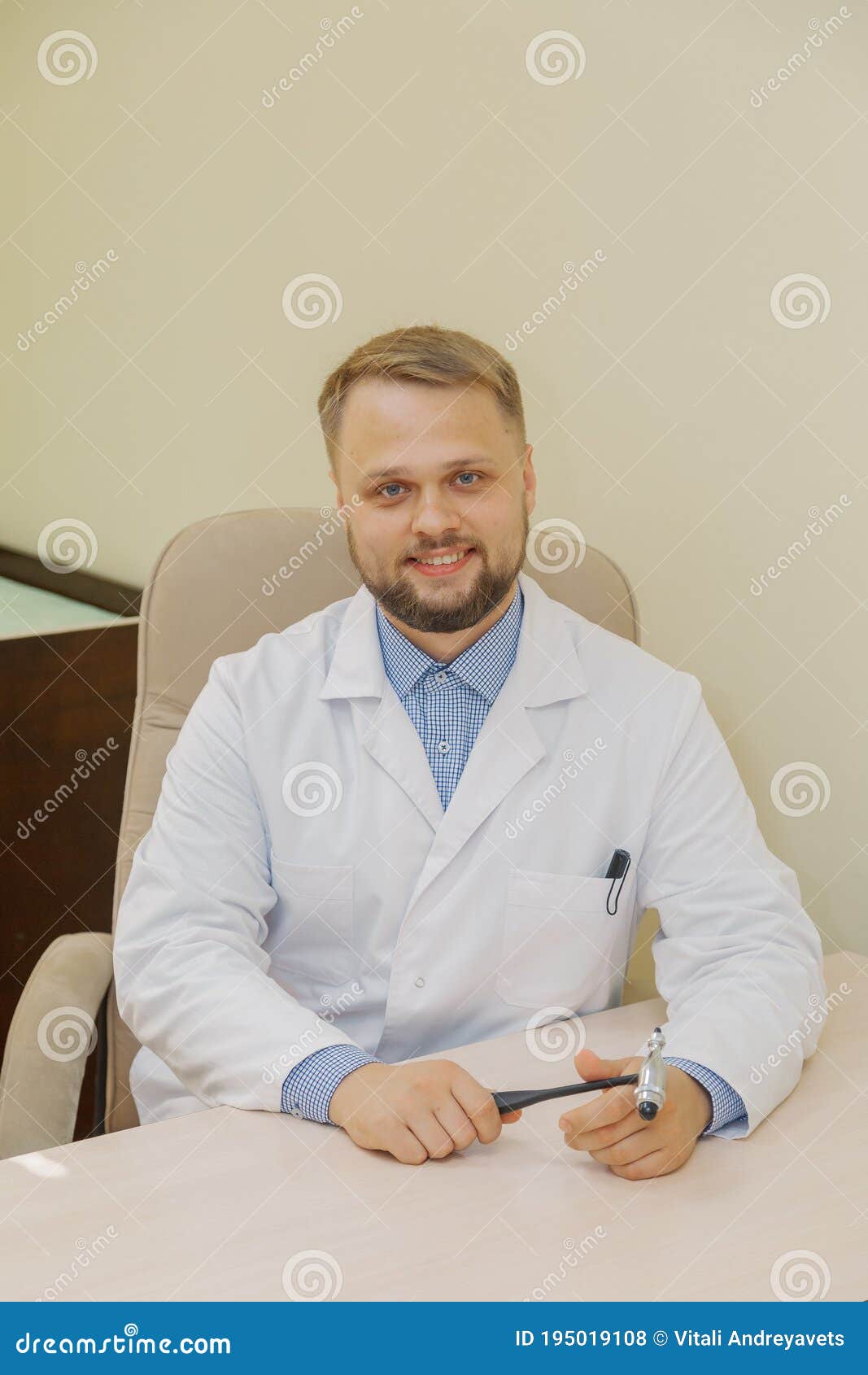 Young Doctor at the Table in His Office. Stock Photo - Image of ...