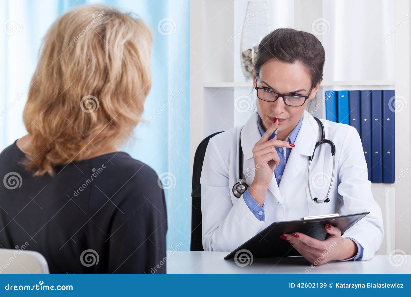 Young Doctor Talking with a Patient Stock Image - Image of professional ...