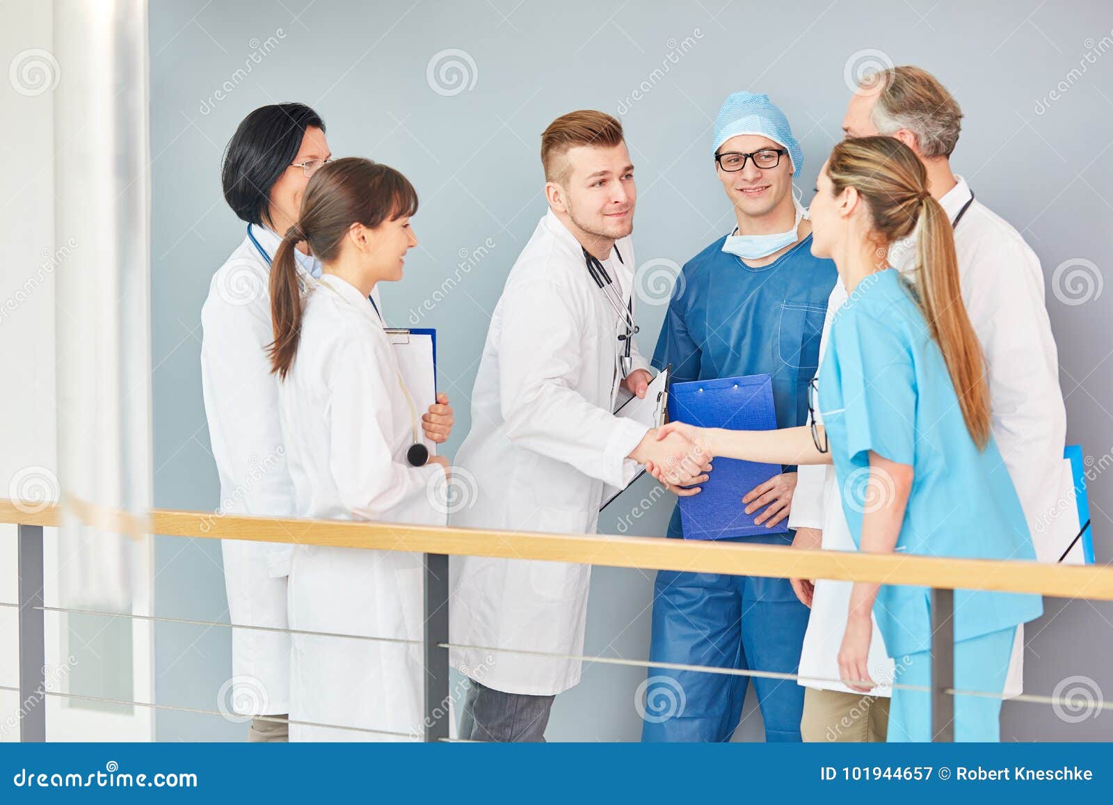 Young Doctor in Training Shake Hands with Doctors Stock Image - Image ...