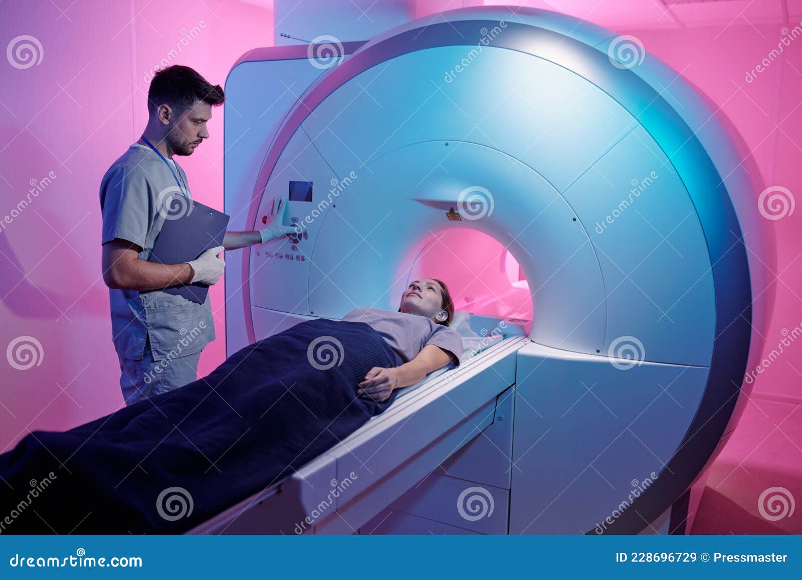 Young Doctor in Uniform Pressing Start Button of Mri Scan Machine with ...