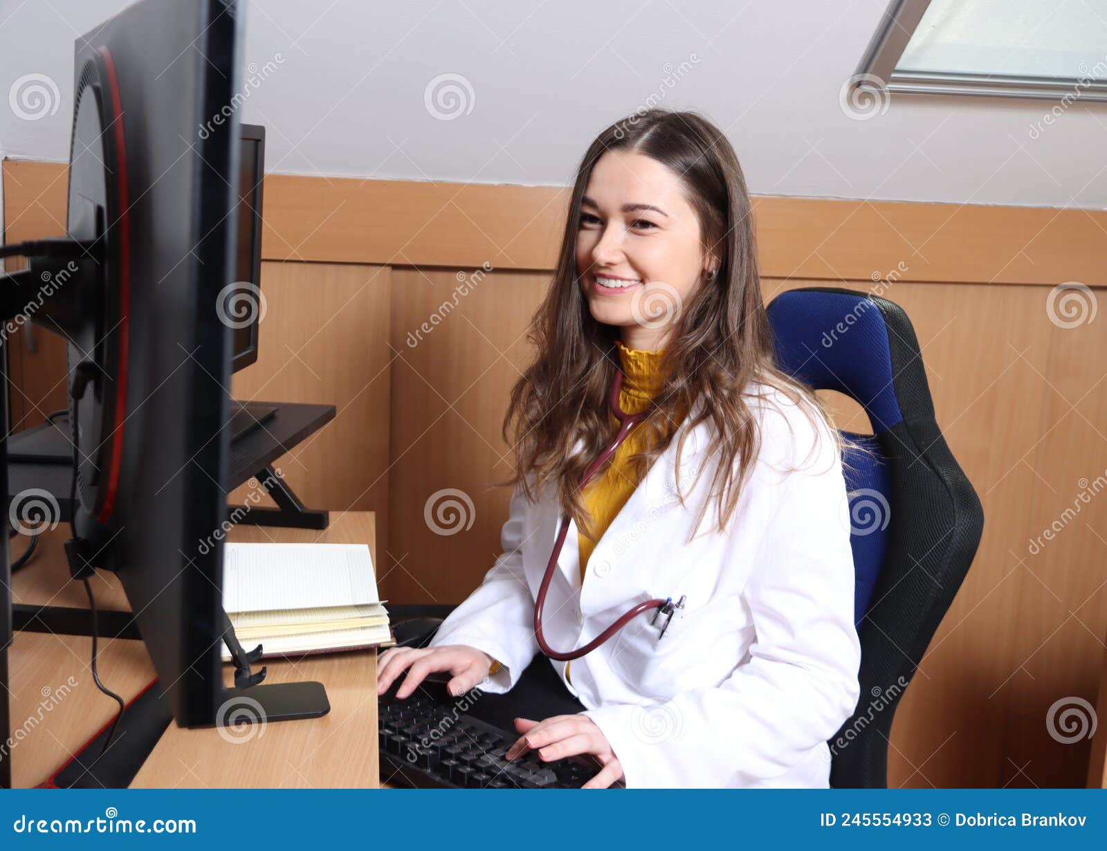 She Works in the Office on the Computer.1 Stock Image - Image of ...