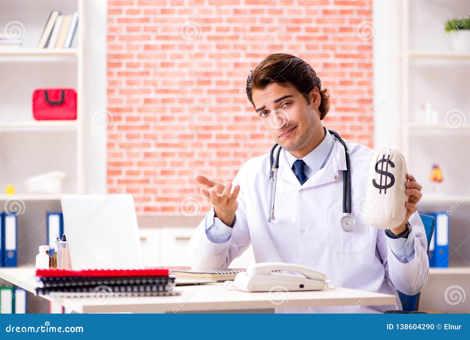 The Young Doctor Working in Hospital Stock Photo - Image of healthcare ...