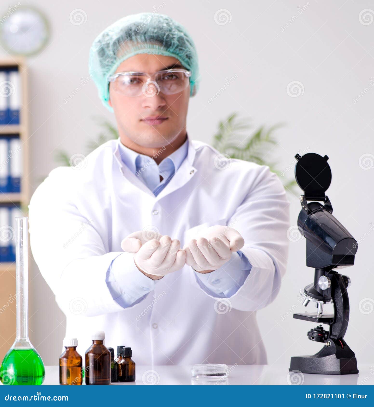 Young Doctor Working in the Lab with Microscope Stock Image - Image of ...