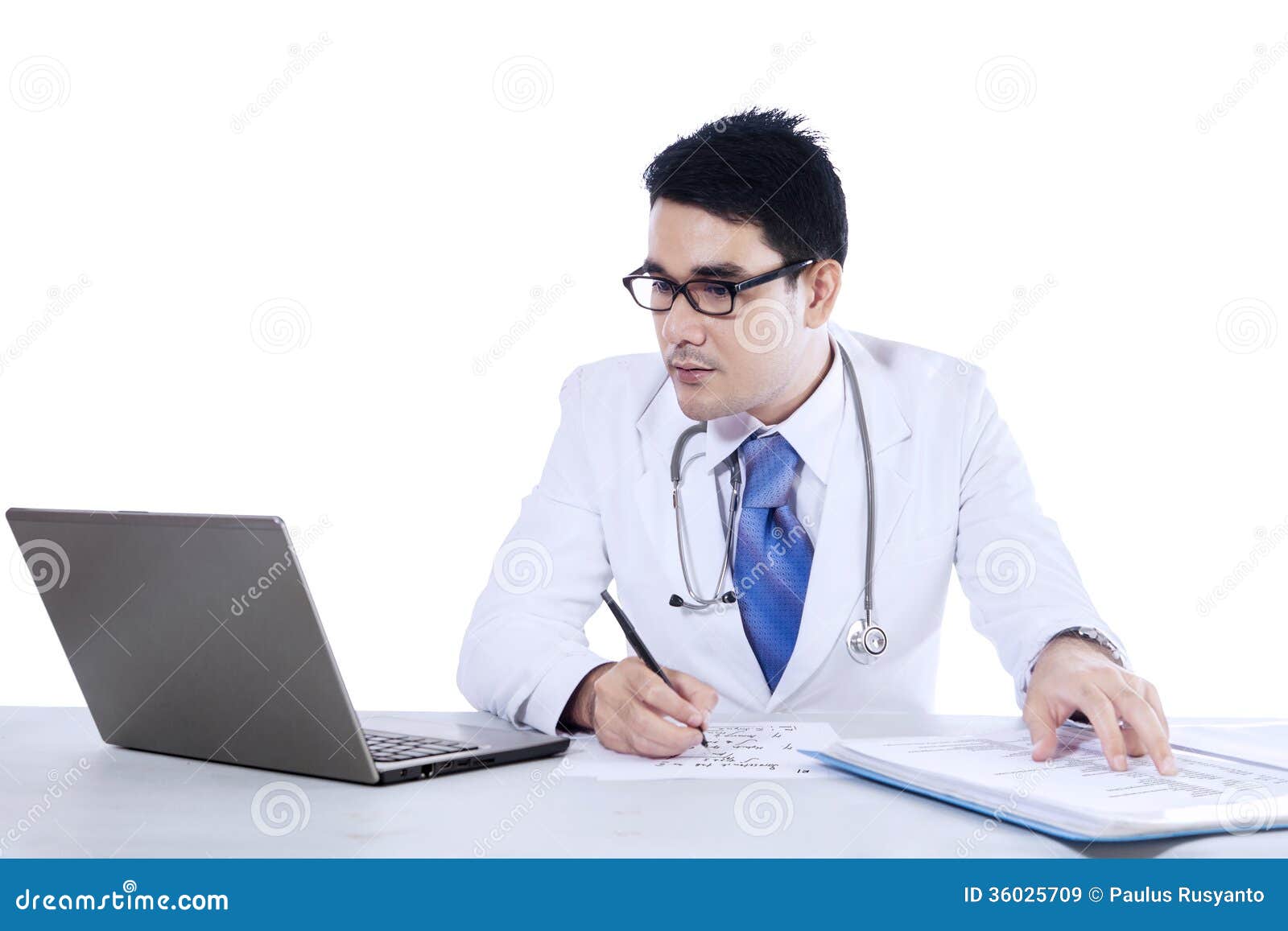 Young Doctor Writing Notes stock image. Image of malaysian - 36025709