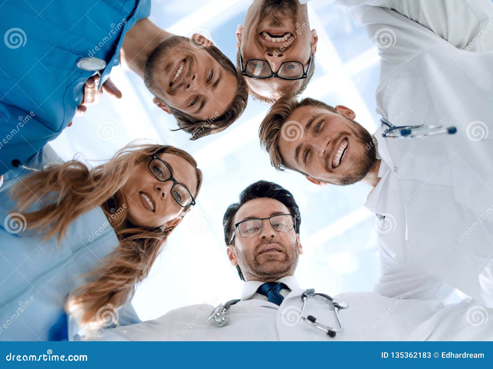 Doctors Looking Down Smiling at the Camera Stock Image - Image of ...