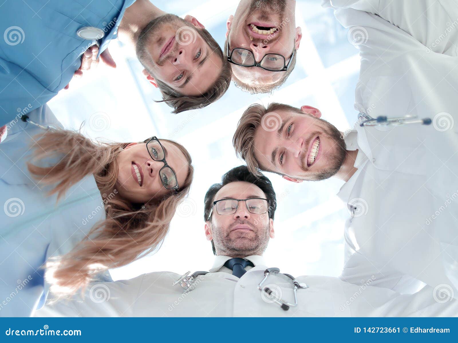 Doctors Looking Down Smiling at the Camera Stock Image - Image of ...
