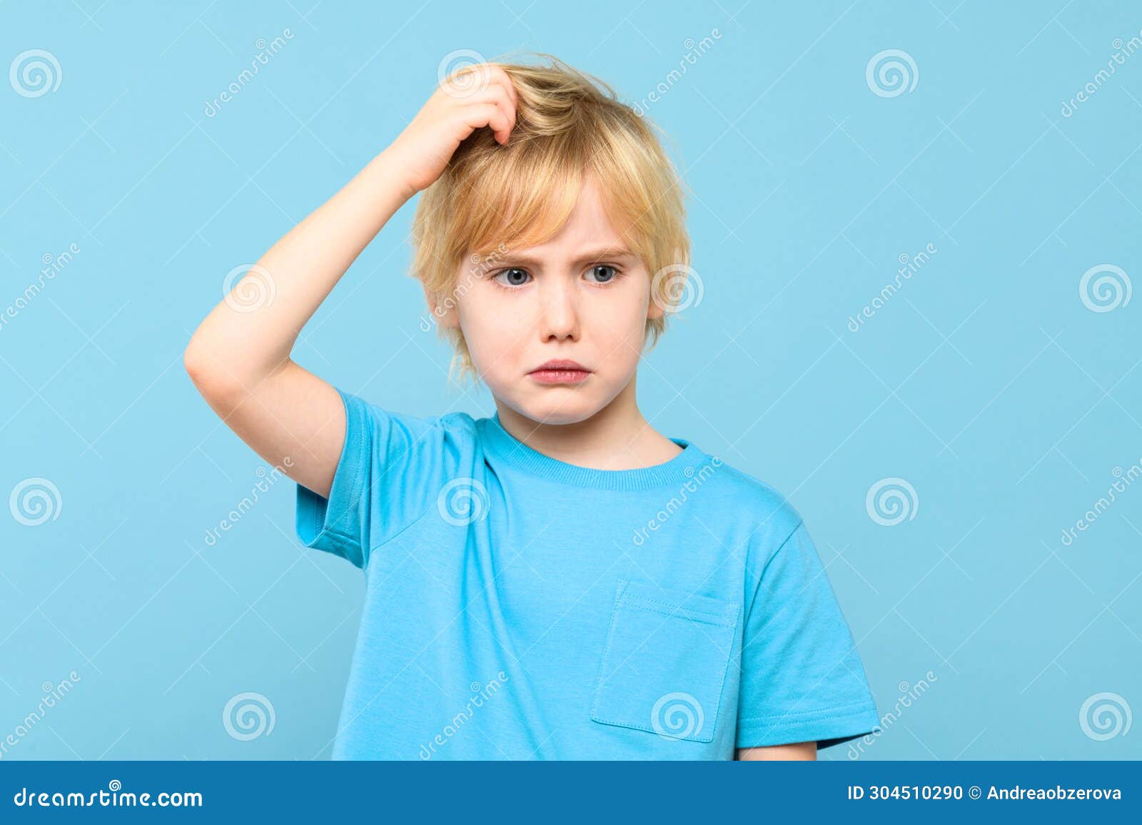 Young Doubtful Confused Boy Thinking, Scratching Head, Trying To Find ...