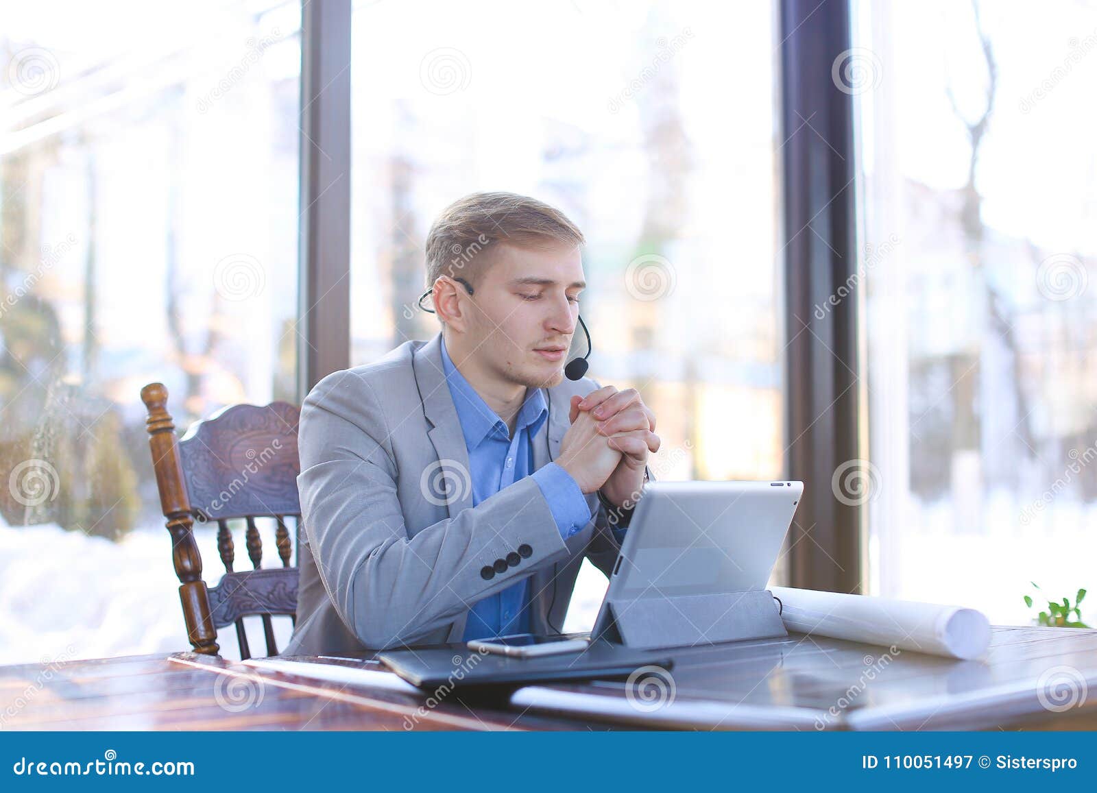 Young Draftsman Talking with Client by Tablet, Headset Phones an Stock ...