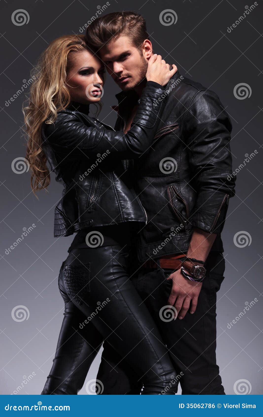Young Dramatic Couple Standing Embraced Stock Photo - Image of close ...