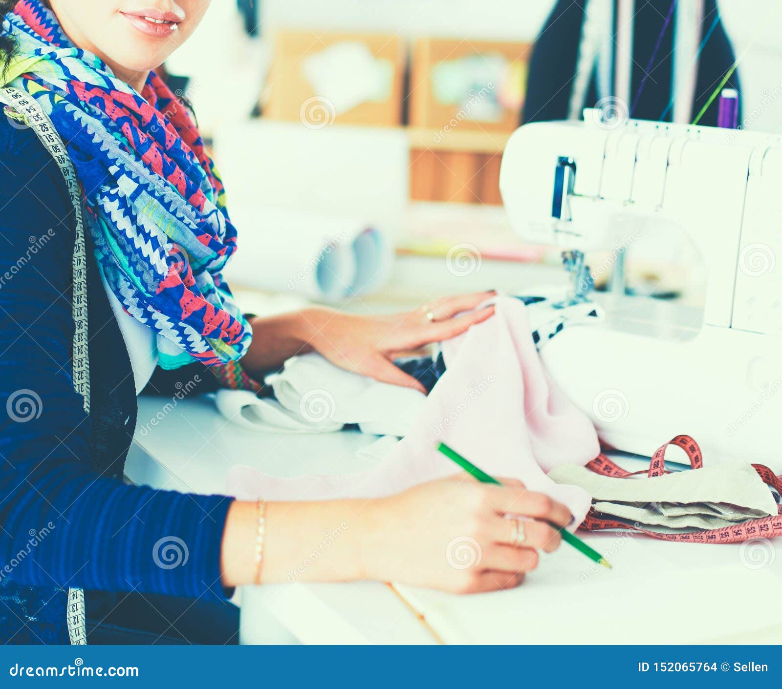 Young Dressmaker Designing Clothes Pattern on Paper Stock Photo - Image ...
