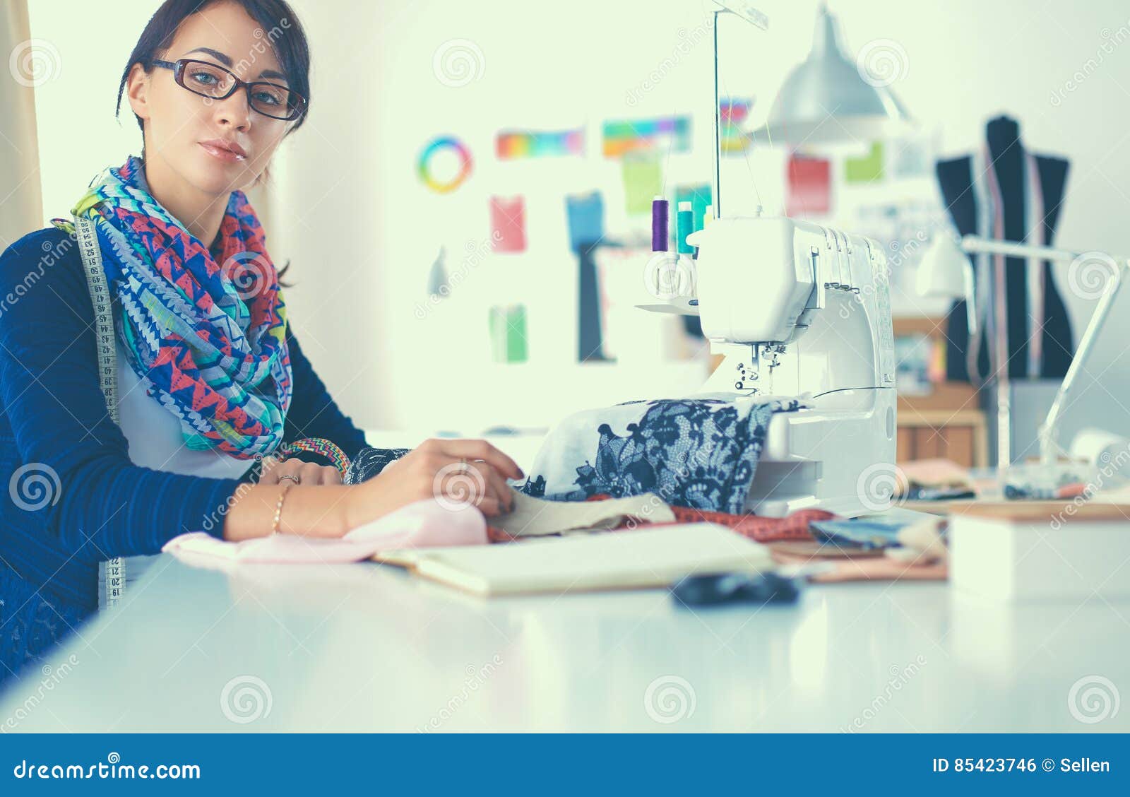 Young Dressmaker Designing Clothes Pattern on Paper Stock Photo - Image ...