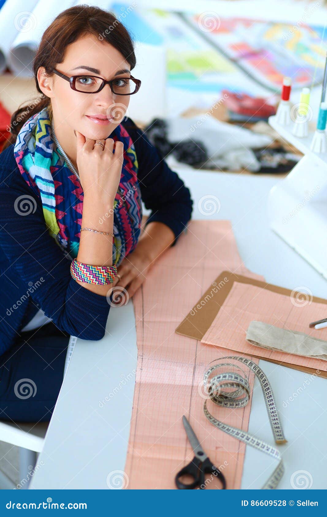 Young Dressmaker Designing Clothes Pattern on Paper Stock Photo - Image ...