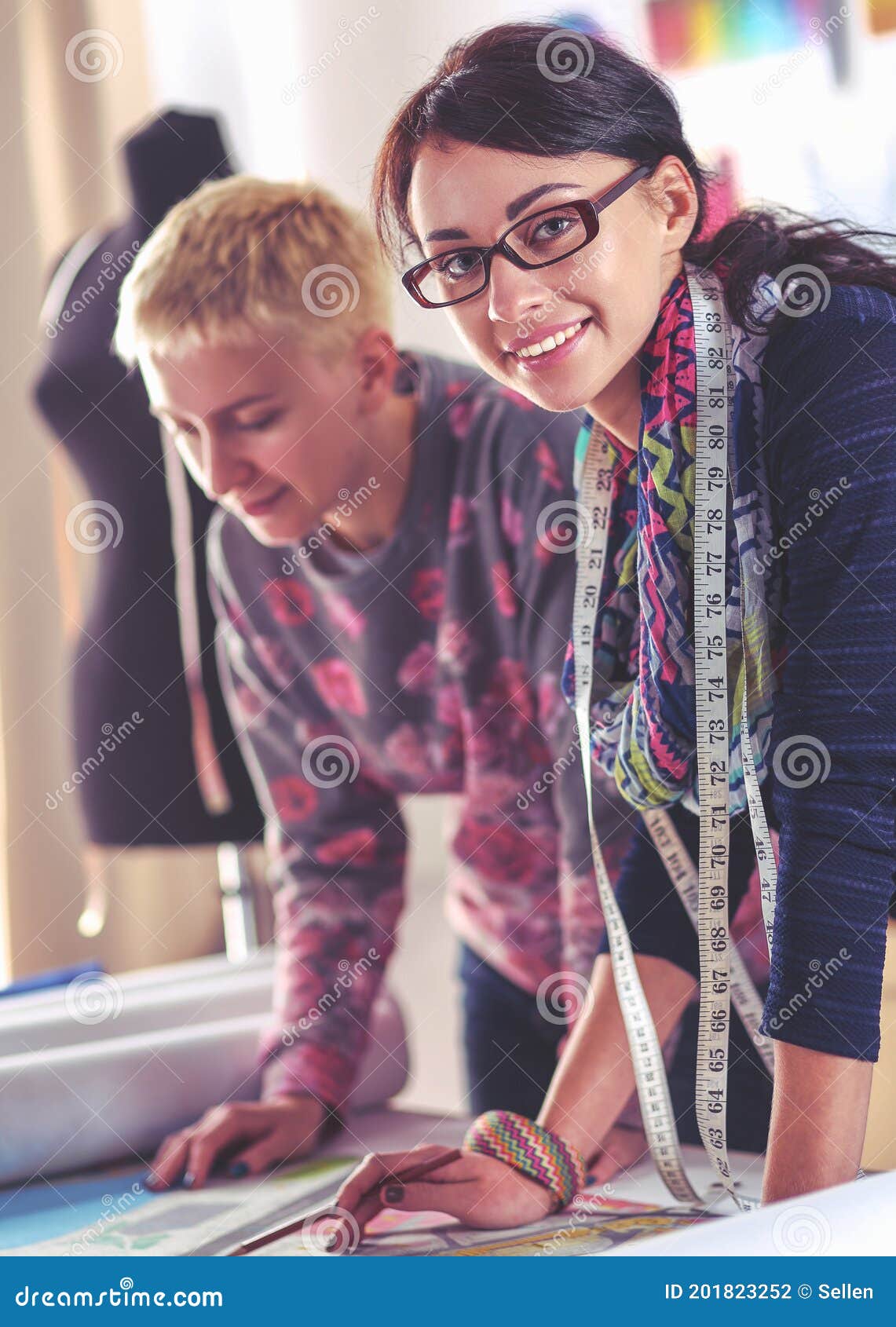 Young Dressmaker Designing Clothes Pattern on Paper Stock Photo - Image ...