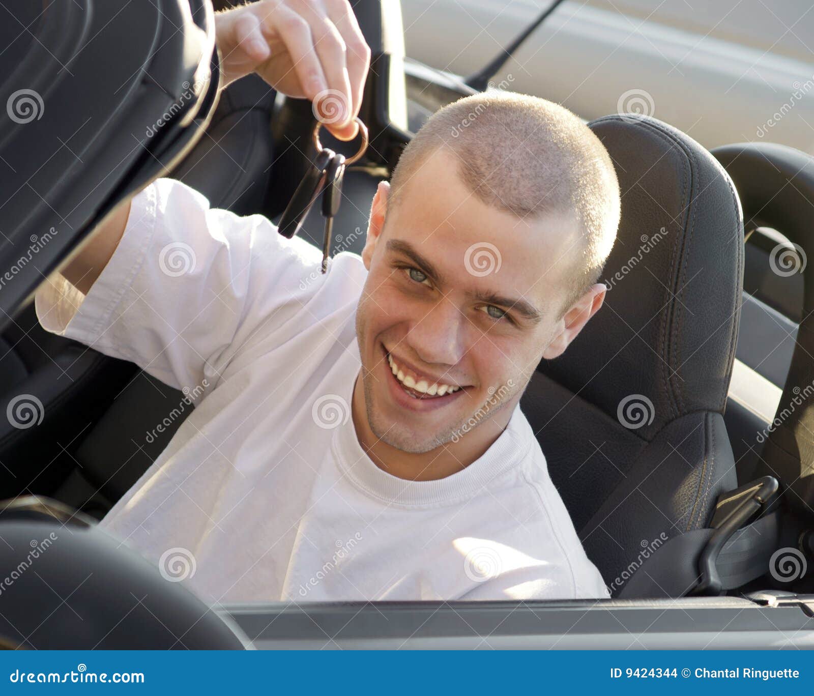 Young driver holding keys stock photo. Image of sports - 9424344