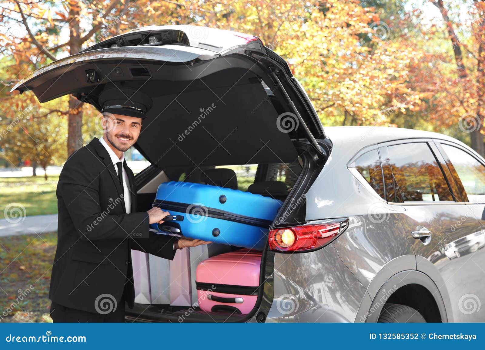 Young Driver Loading Suitcases into Car Trunk Stock Photo - Image of ...