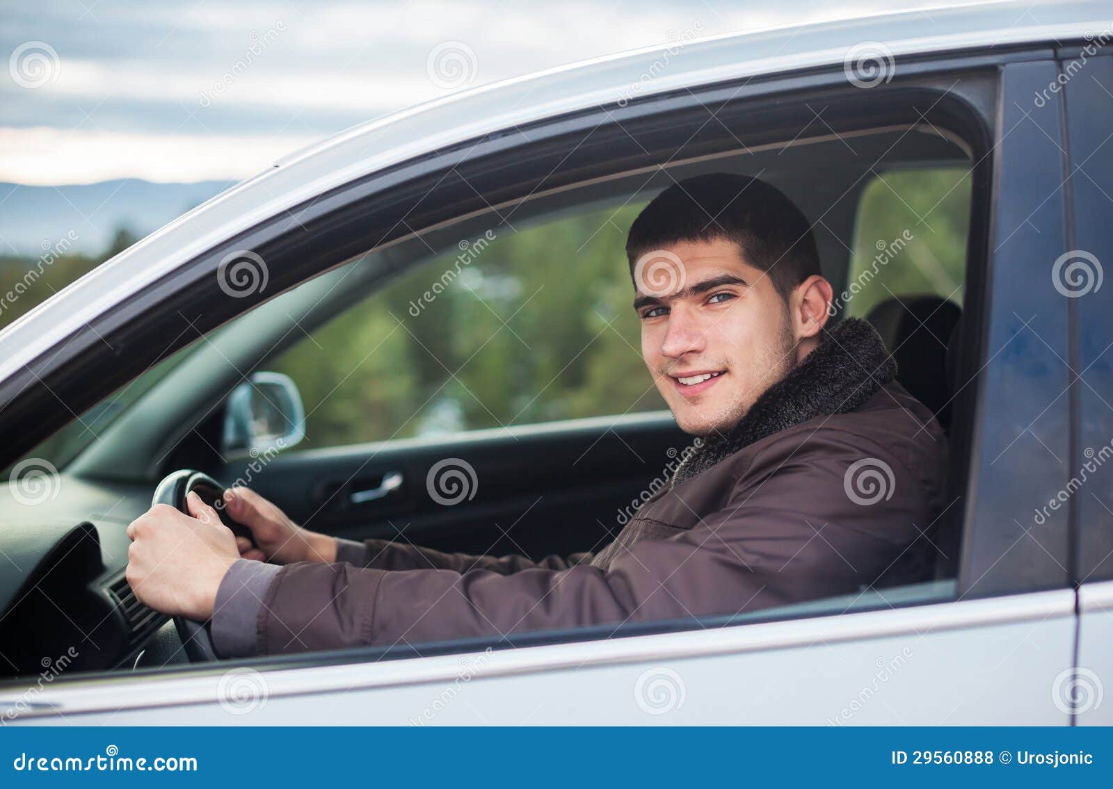 Young Driver Sitting in a Car Stock Photo - Image of selective, proud ...