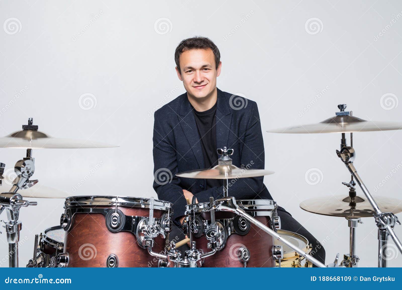 Young Drummer Behind Drum Set and Plays the Drums Isolated on White ...