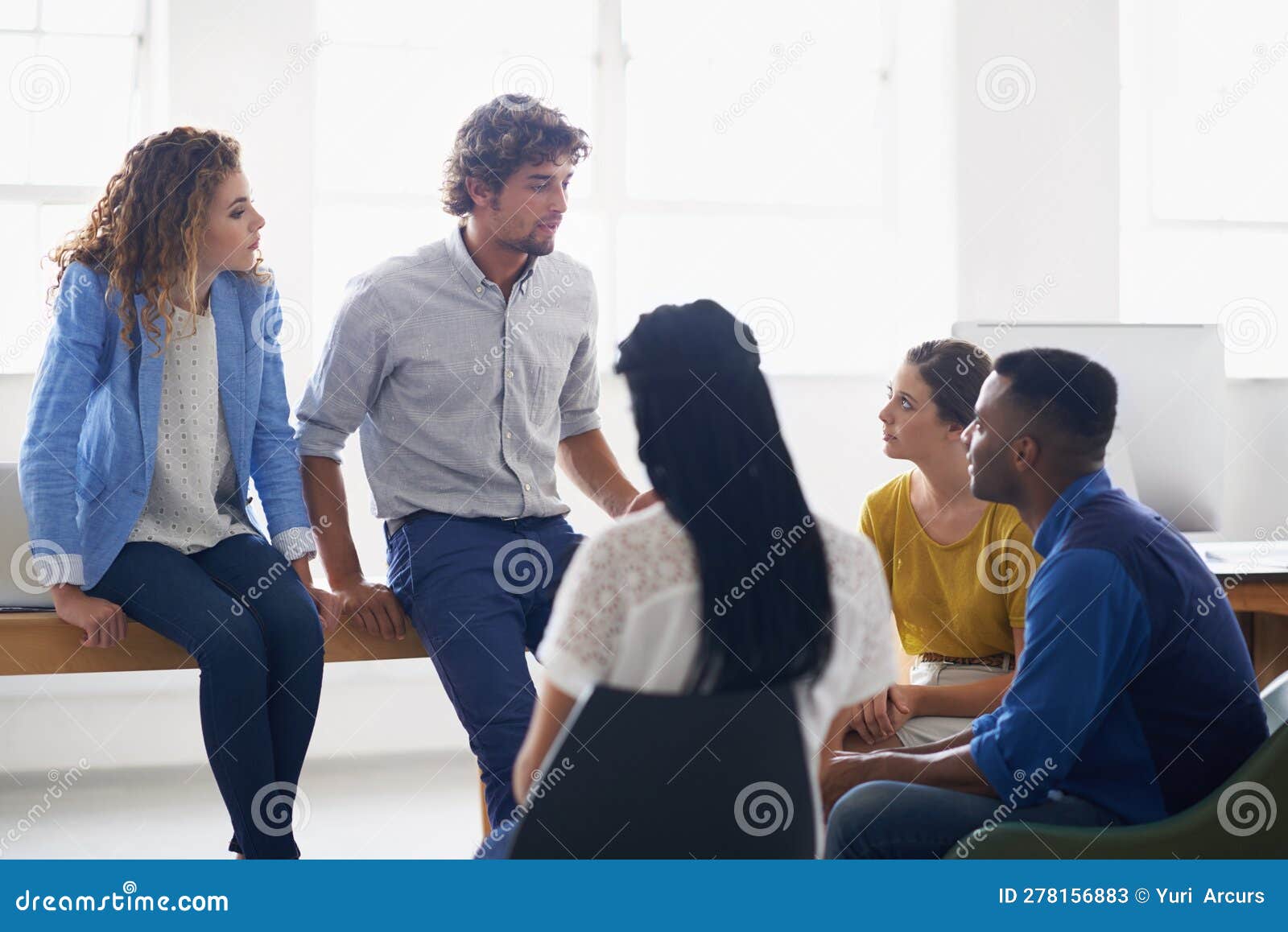 Young and Dynamic. a Group of Colleagues in a Meeting. Stock Image ...