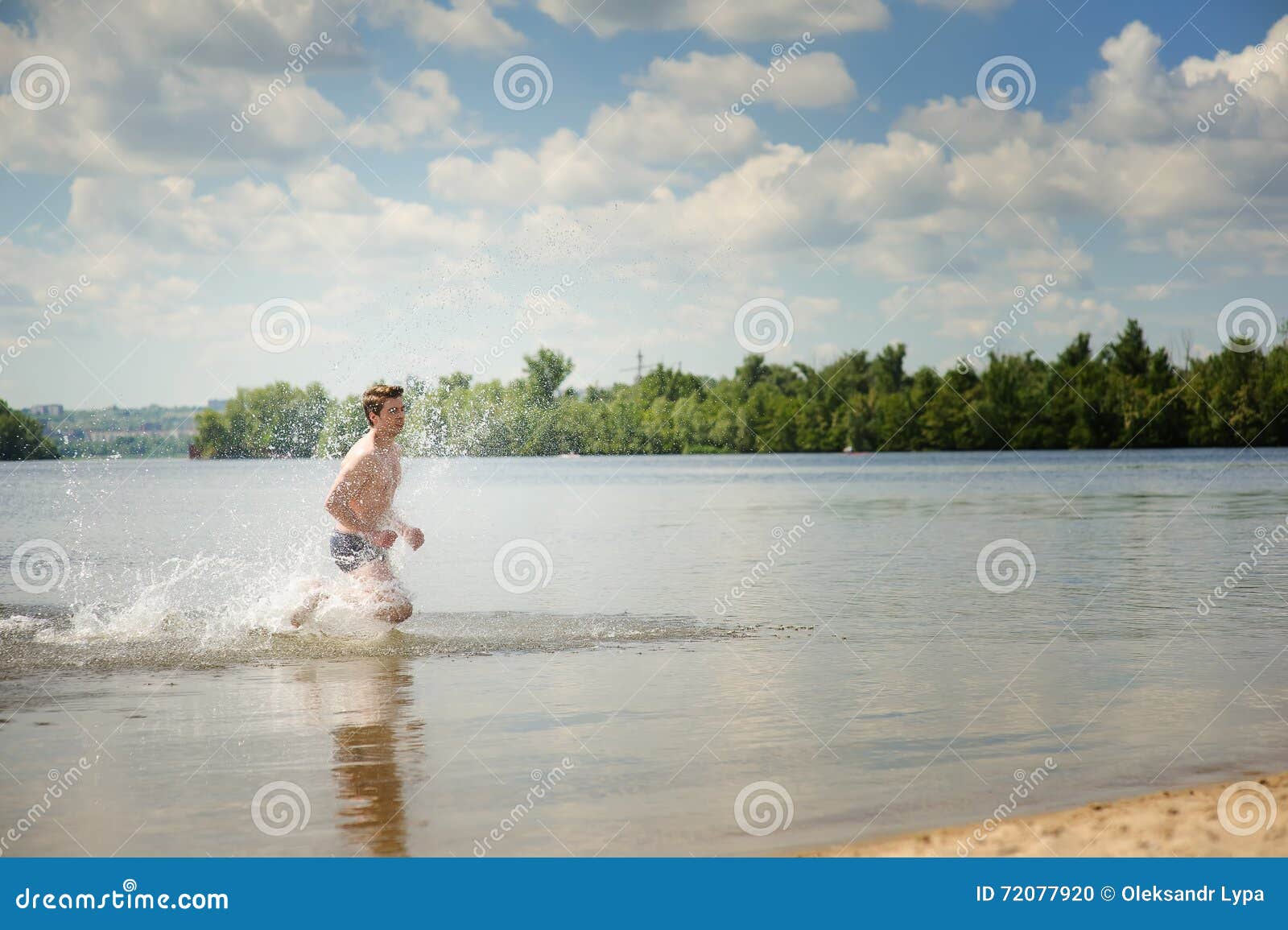 Young Dynamic Man Runs in Water Stock Photo - Image of outdoor, active ...