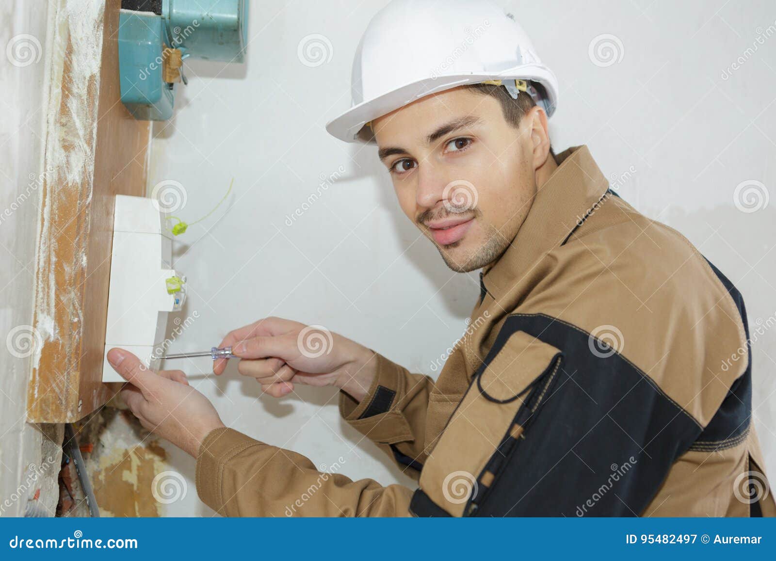 Electrician Builder At Work Inspecting Cabling Connection Of High ...