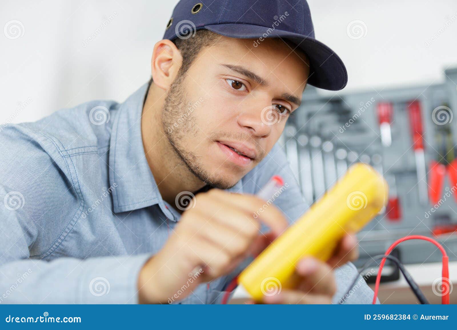 Young Electrician Using Multi Meter Stock Photo - Image of appliance ...