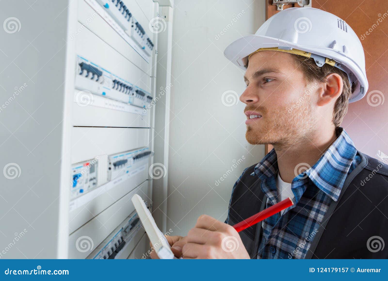Young Electrician Working on Electric Panel Stock Image - Image of ...