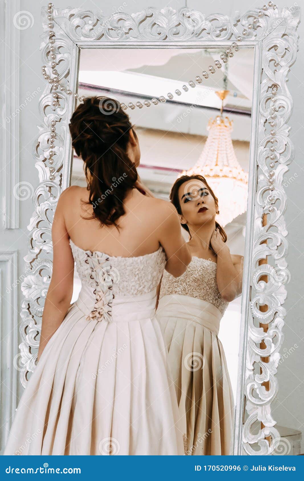 Young Elegant Lady in Front of Mirror Stock Photo - Image of body ...