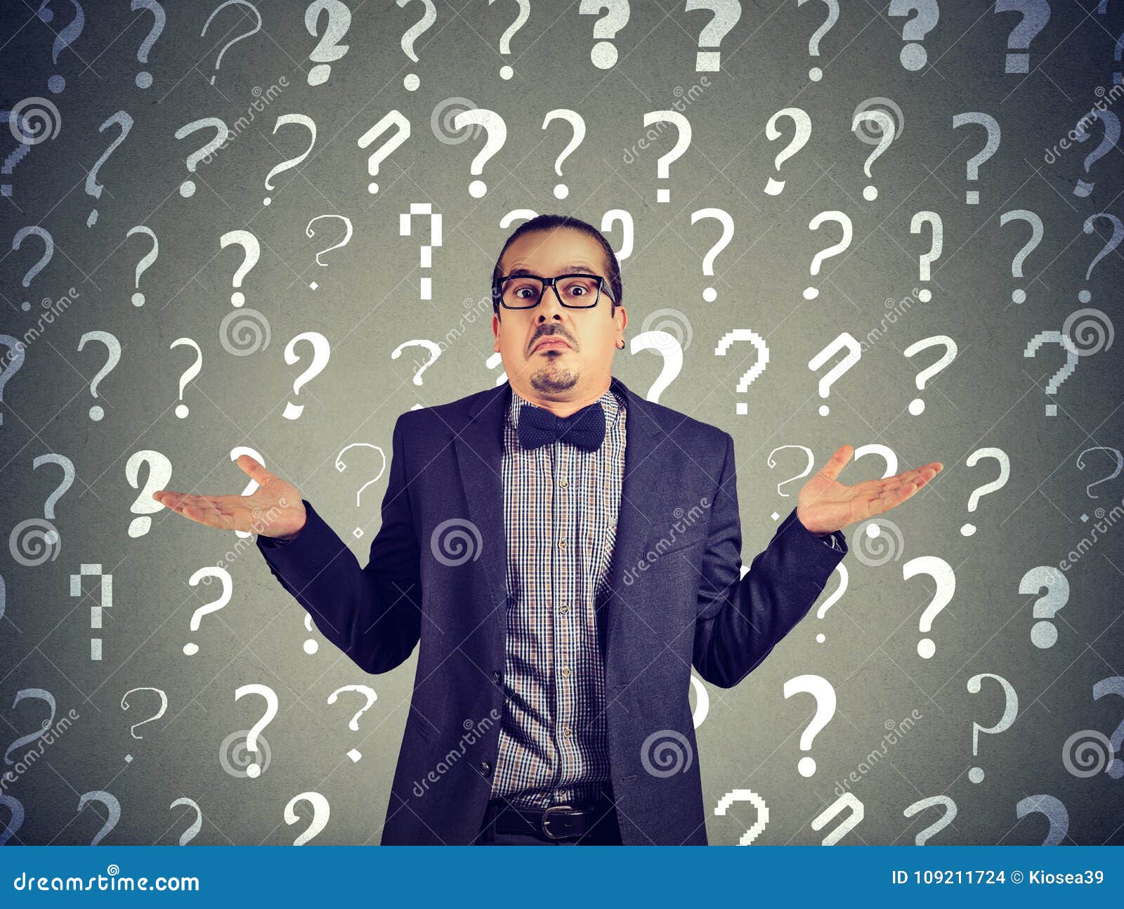 Ignorant Man in Question Marks Stock Photo - Image of gesturing ...