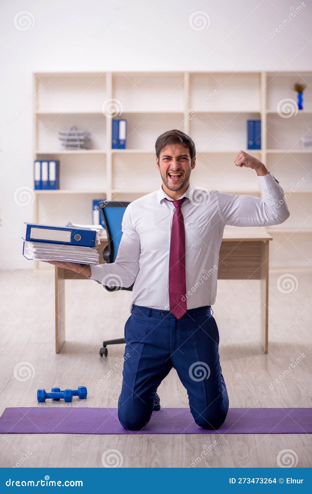 Young Male Employee Doing Sport Exercises during Break Stock Photo ...