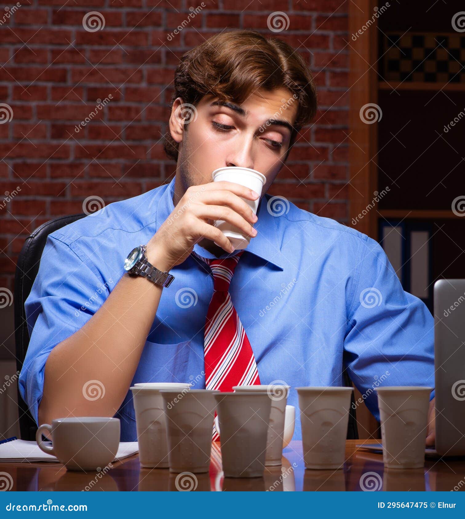Young Employee Drinking Coffee Working at Night Shift Stock Image ...