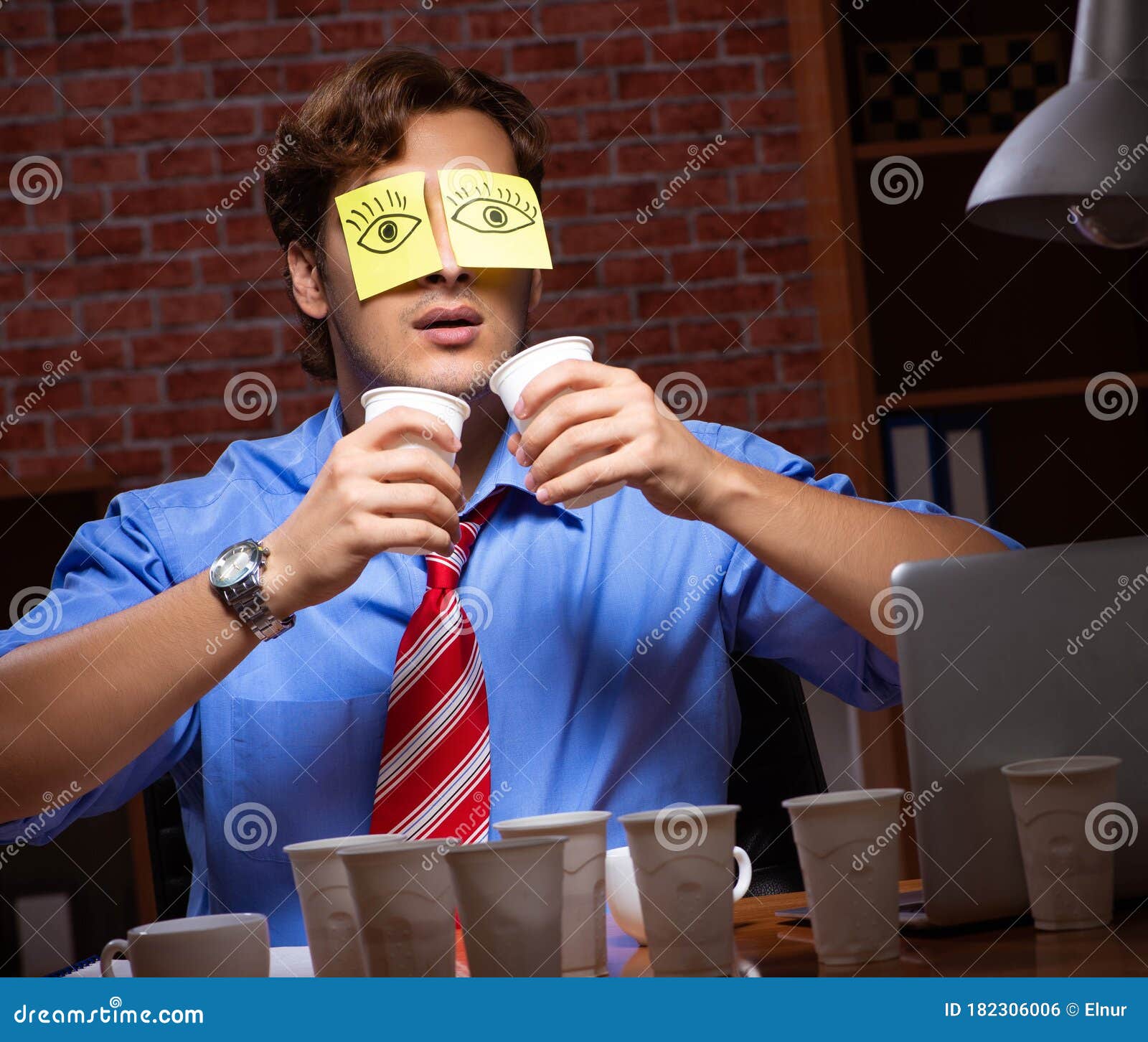 Young Employee Drinking Coffee Working at Night Shift Stock Photo ...