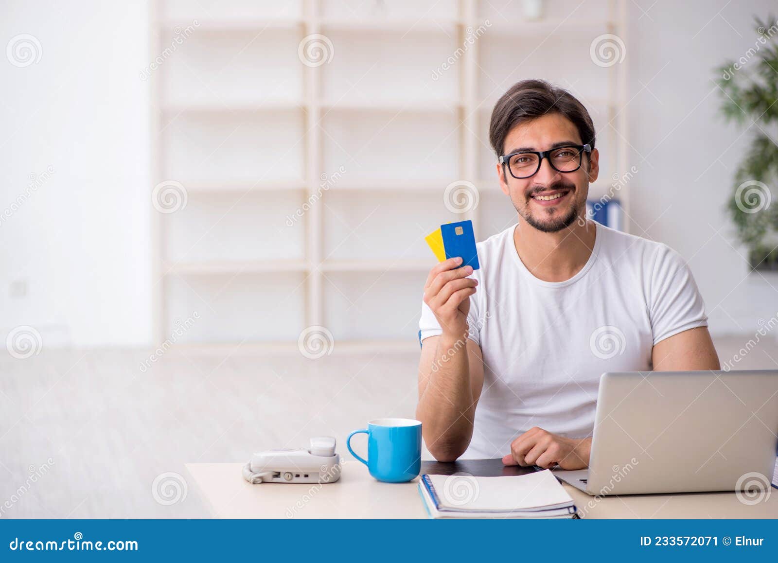 Young Male Employee in E-commerce Concept Stock Image - Image of office ...