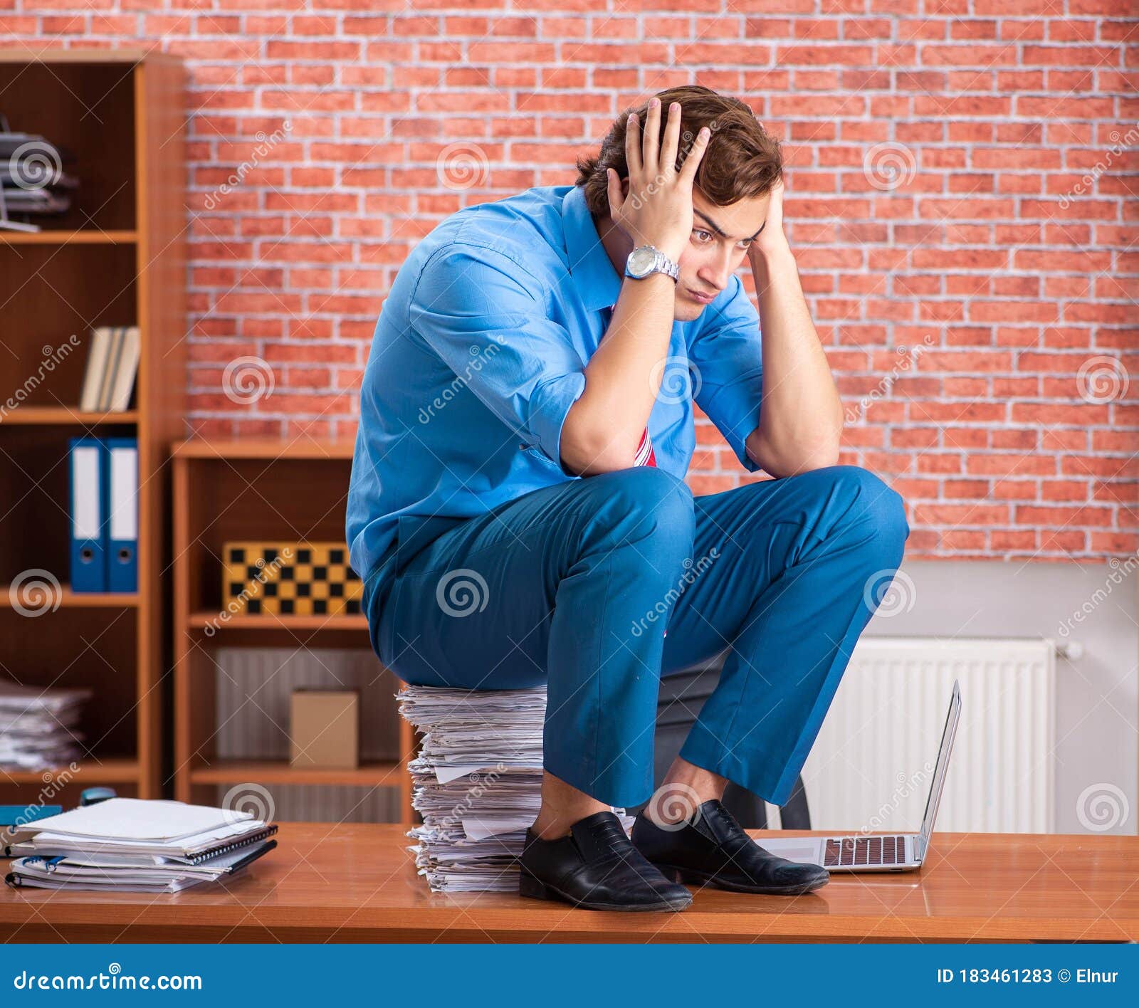 Young Employee with Excessive Work Sitting at the Office Stock Image ...