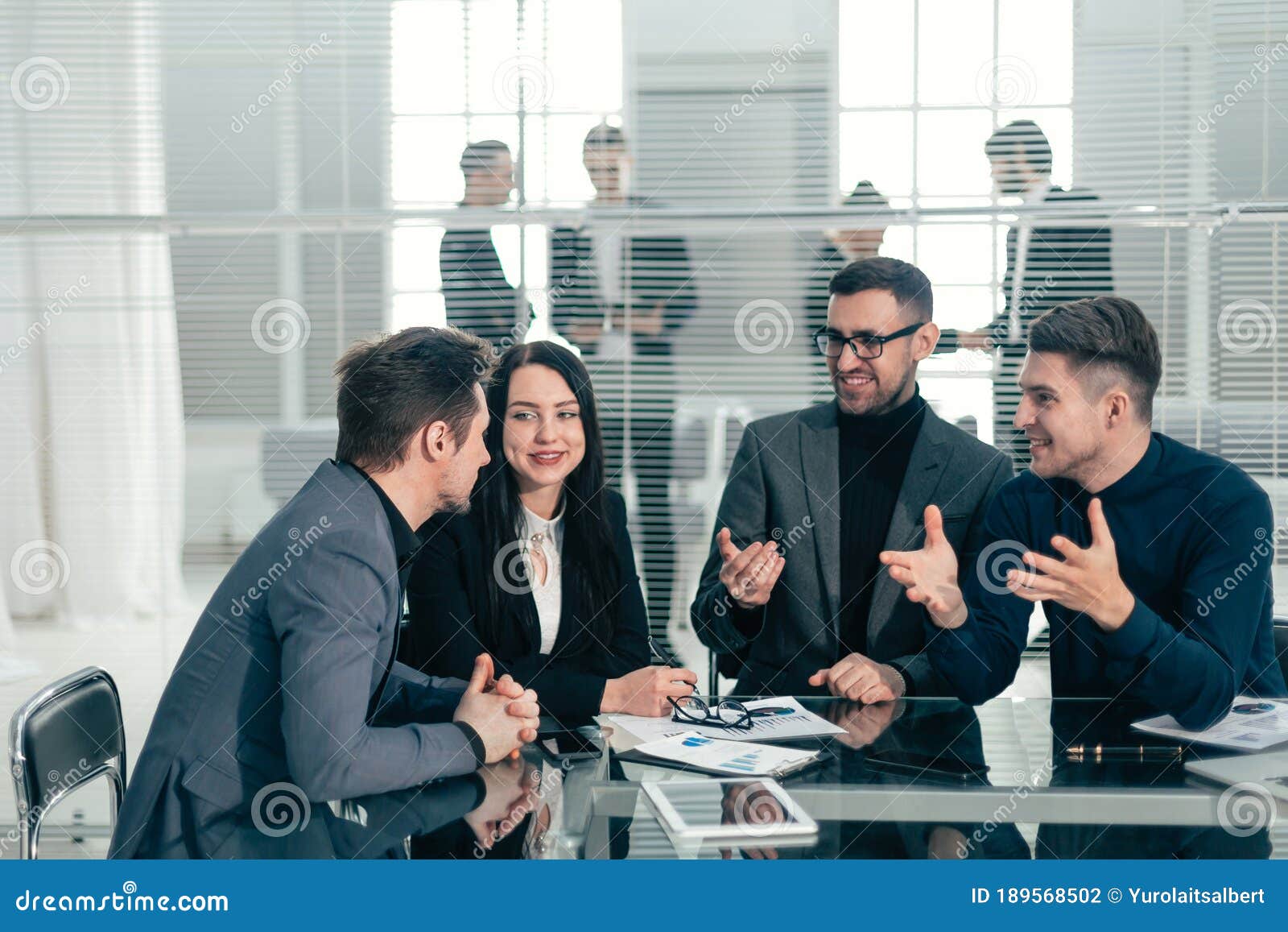 Young Employee Explaining His Ideas To Colleagues. Stock Photo - Image ...