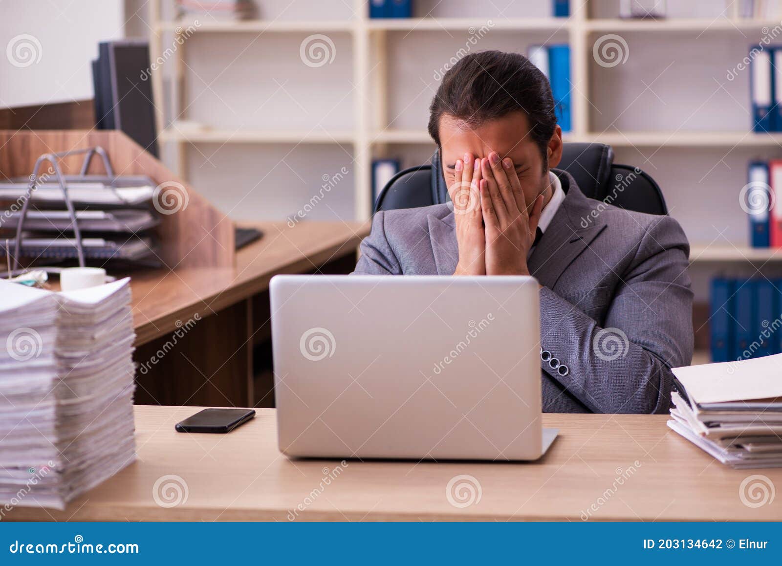 Young Male Employee Extremely Tired with Excessive Work Stock Photo ...