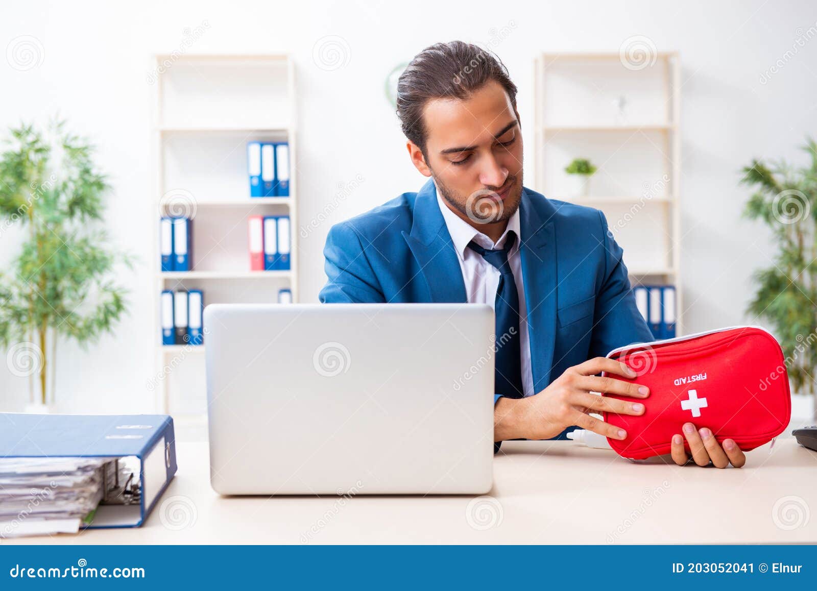 Young Male Employee in First Aid Concept Stock Image - Image of illness ...