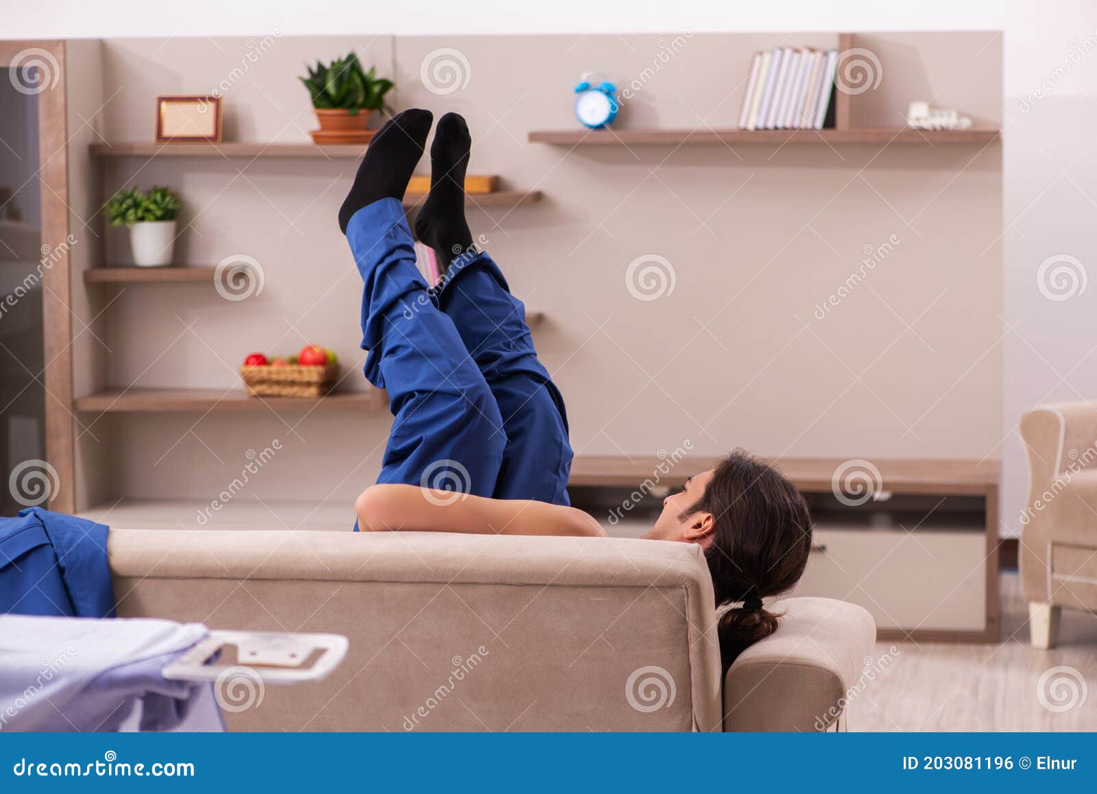 Young Male Employee Getting Up Late at Home Stock Photo - Image of ...