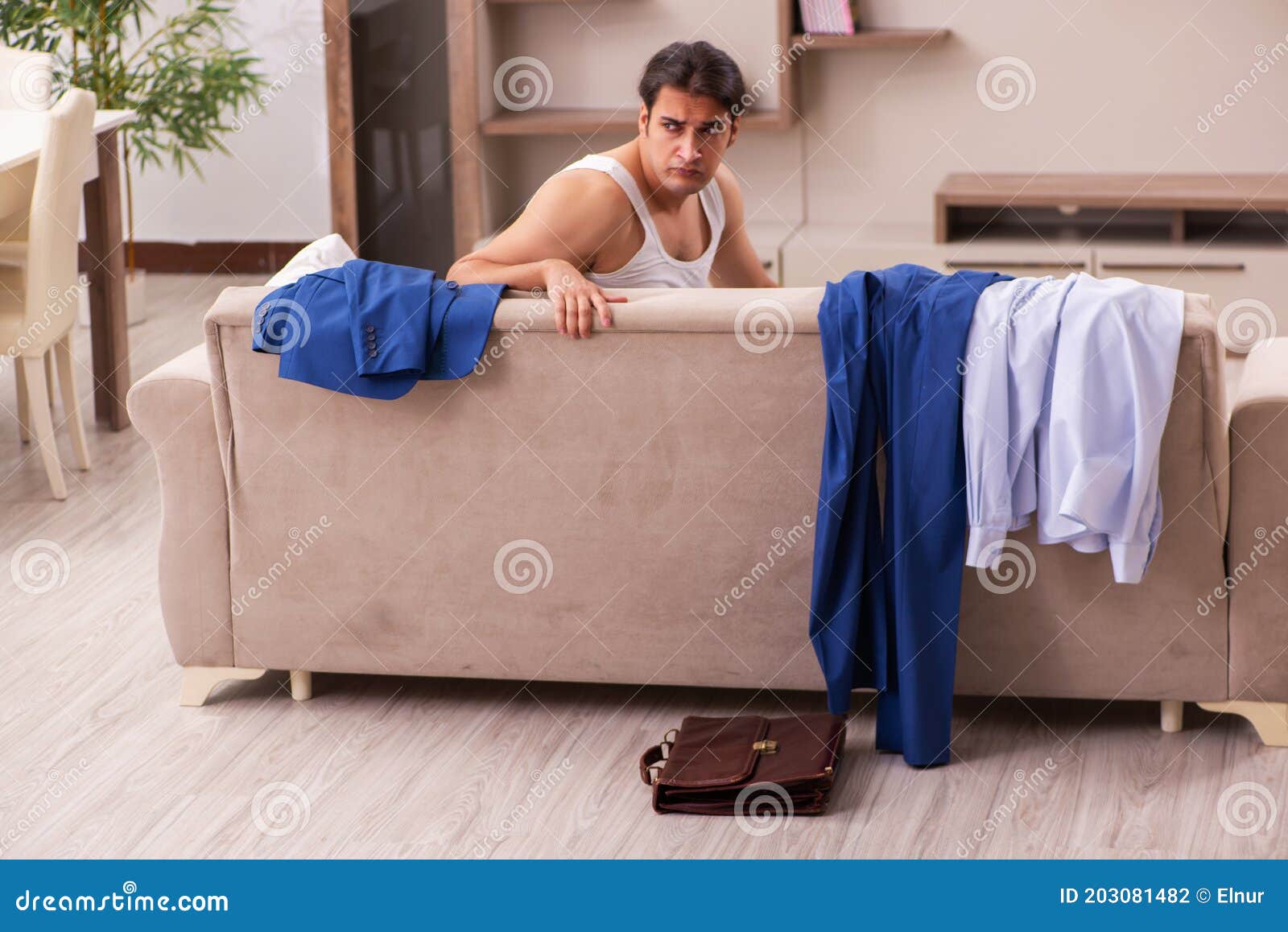 Young Male Employee Getting Up Late at Home Stock Photo - Image of ...