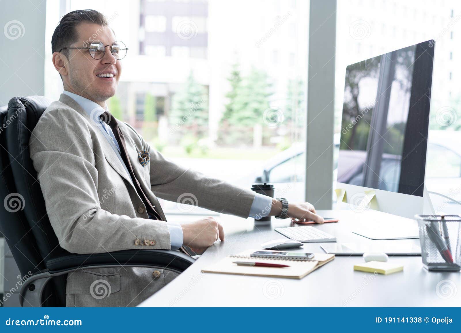 Young Employee Looking at Computer Monitor during Working Day in Office ...