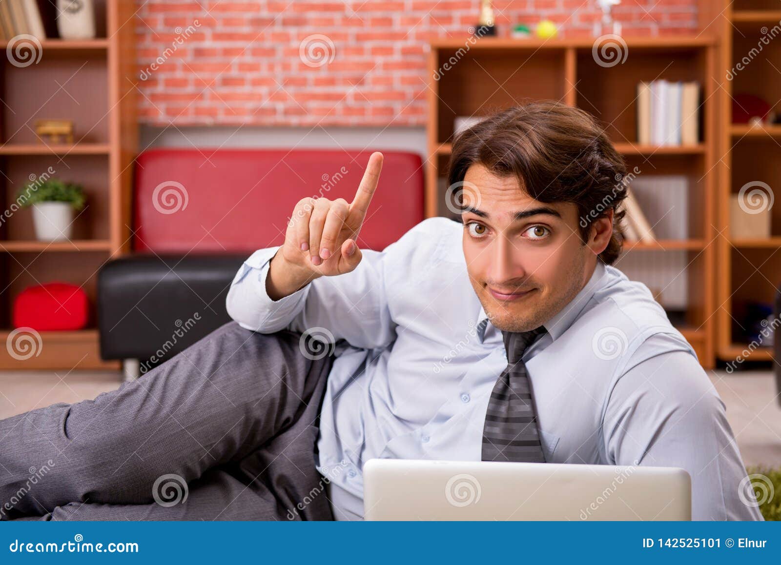 The Young Employee Lying on the Floor at Office Stock Image - Image of ...