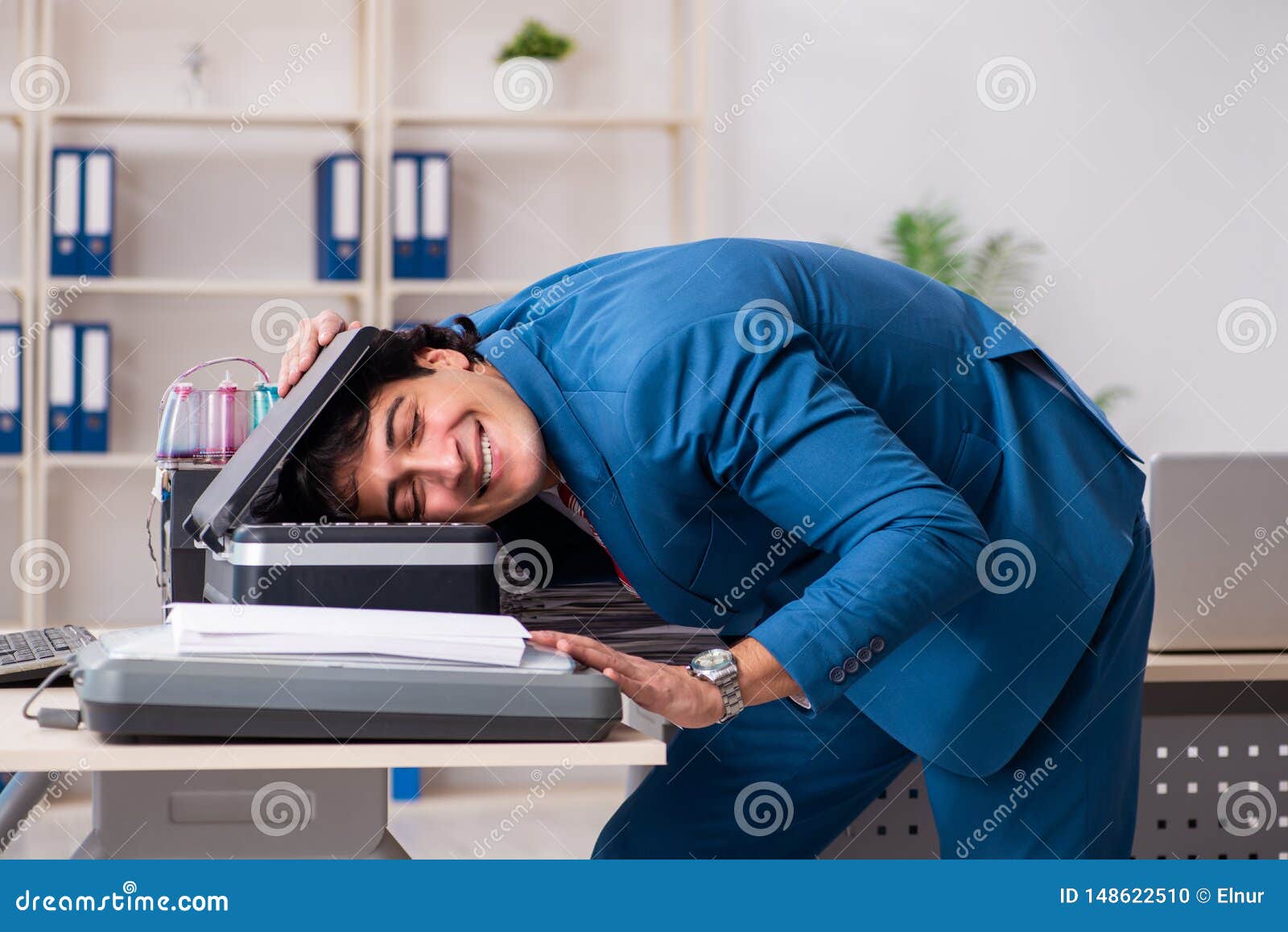 Young Employee Making Copies at Copying Machine Stock Photo - Image of ...