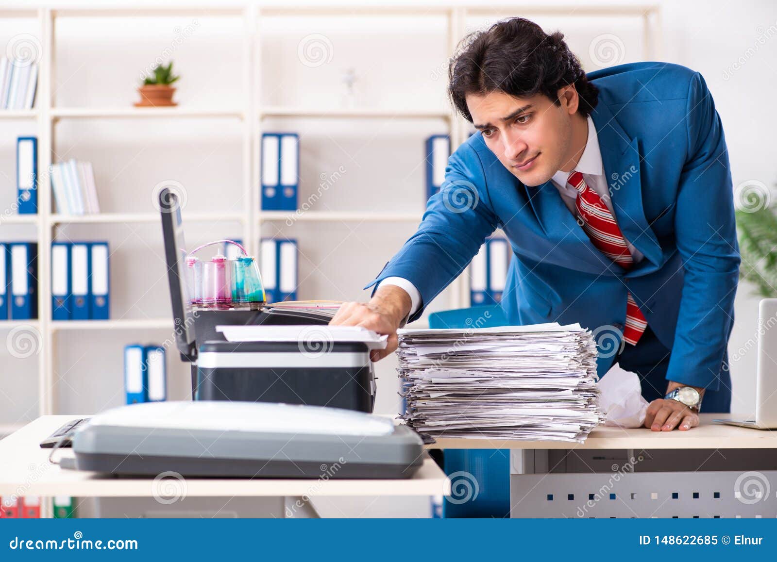 Young Employee Making Copies at Copying Machine Stock Image - Image of ...