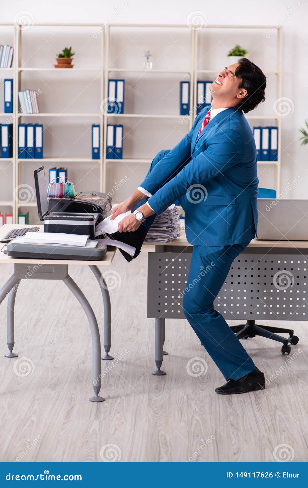 The Young Employee Making Copies at Copying Machine Stock Photo - Image ...