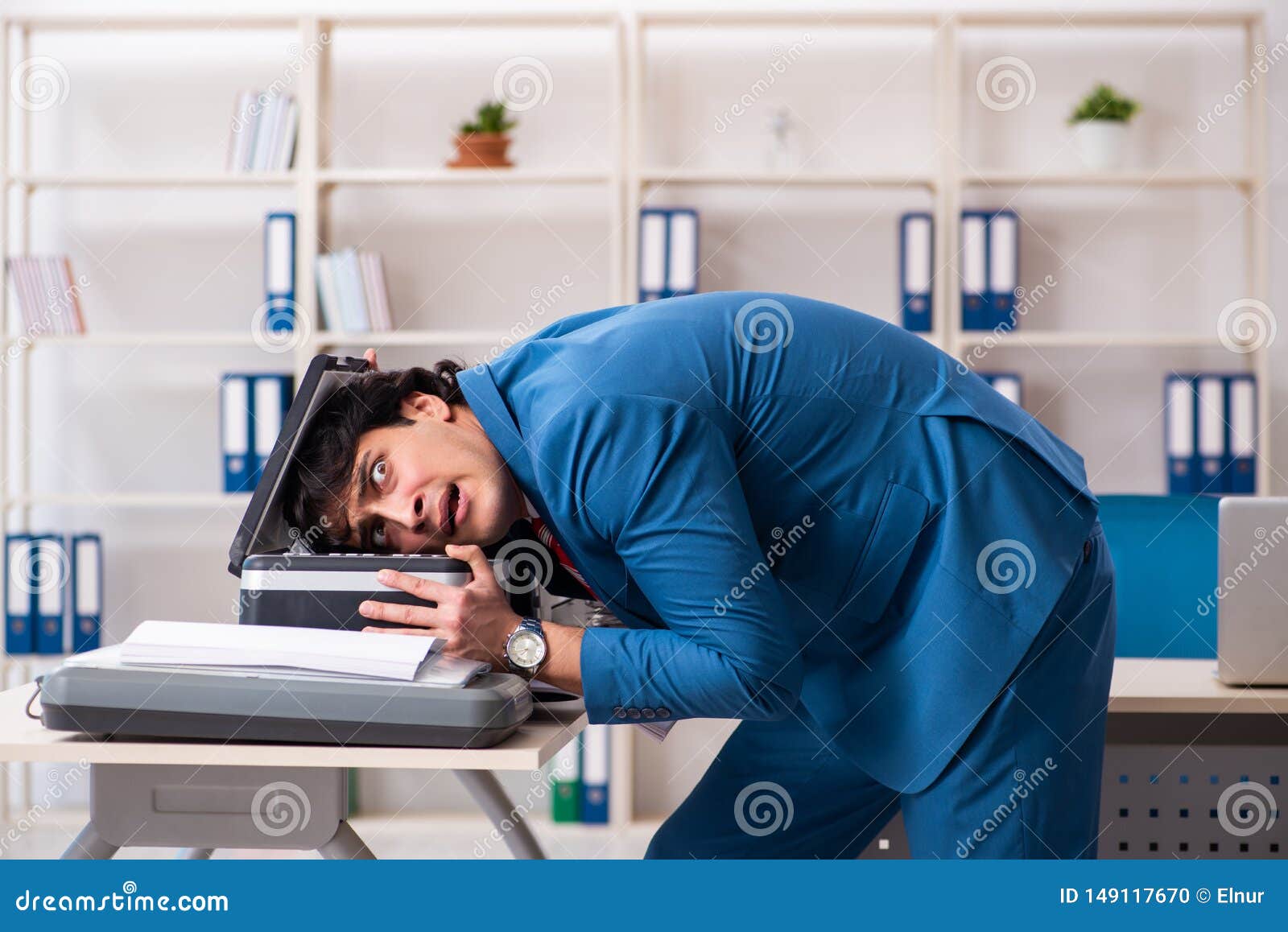 The Young Employee Making Copies at Copying Machine Stock Photo - Image ...