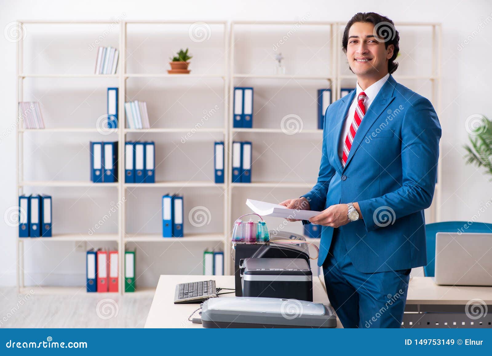 Young Employee Making Copies at Copying Machine Stock Image - Image of ...
