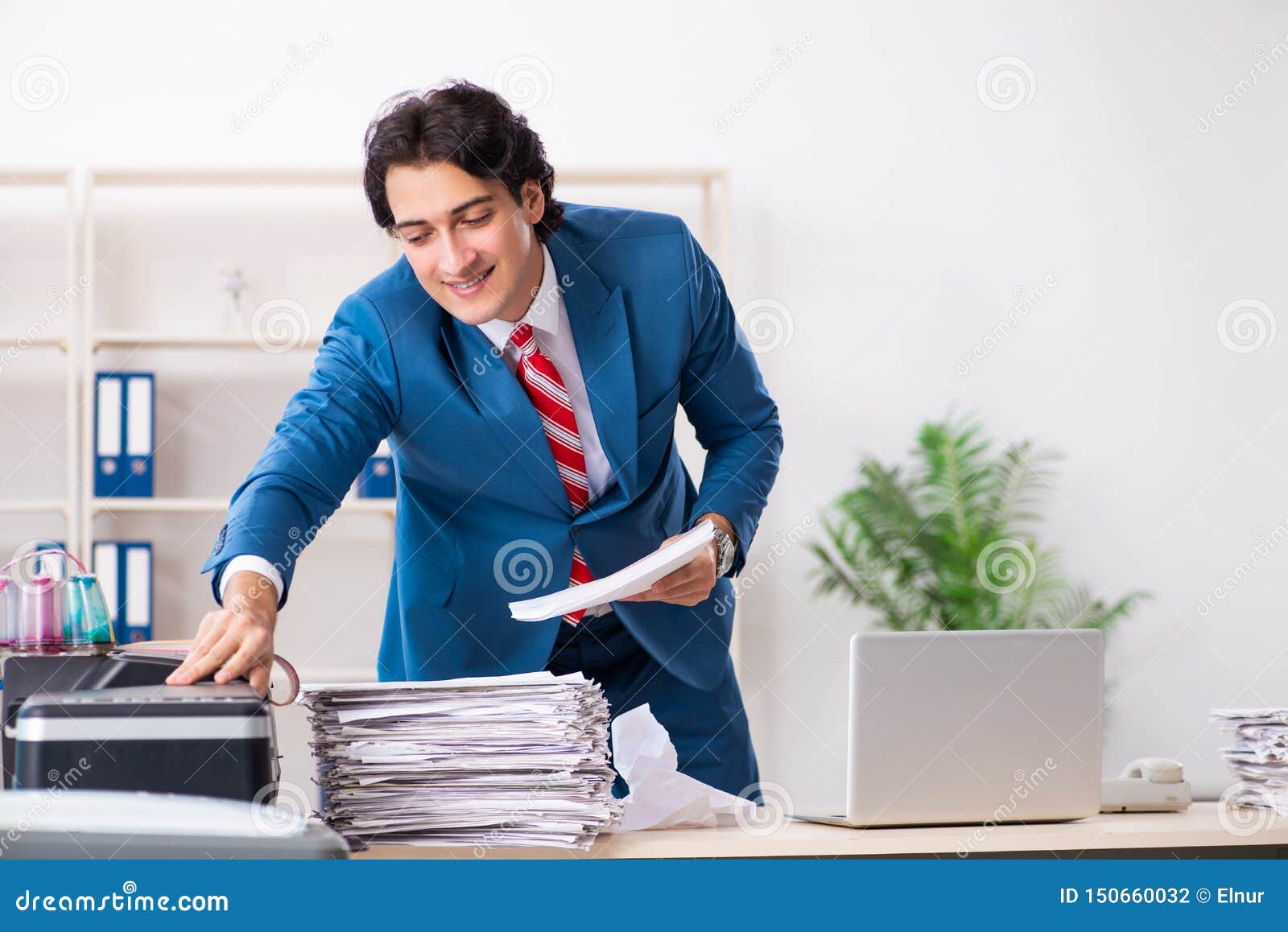 The Young Employee Making Copies at Copying Machine Stock Photo - Image ...