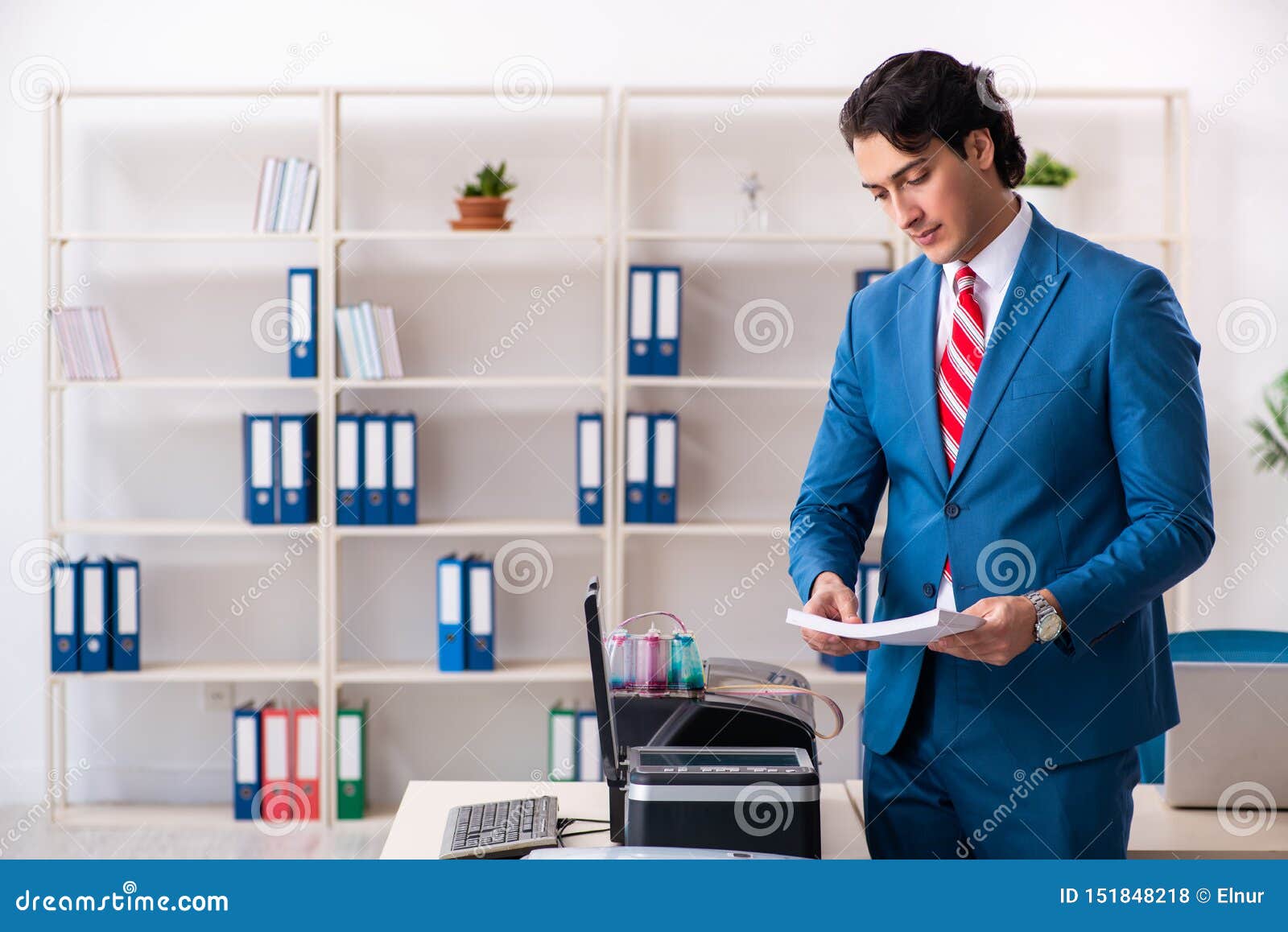 Young Employee Making Copies at Copying Machine Stock Photo - Image of ...